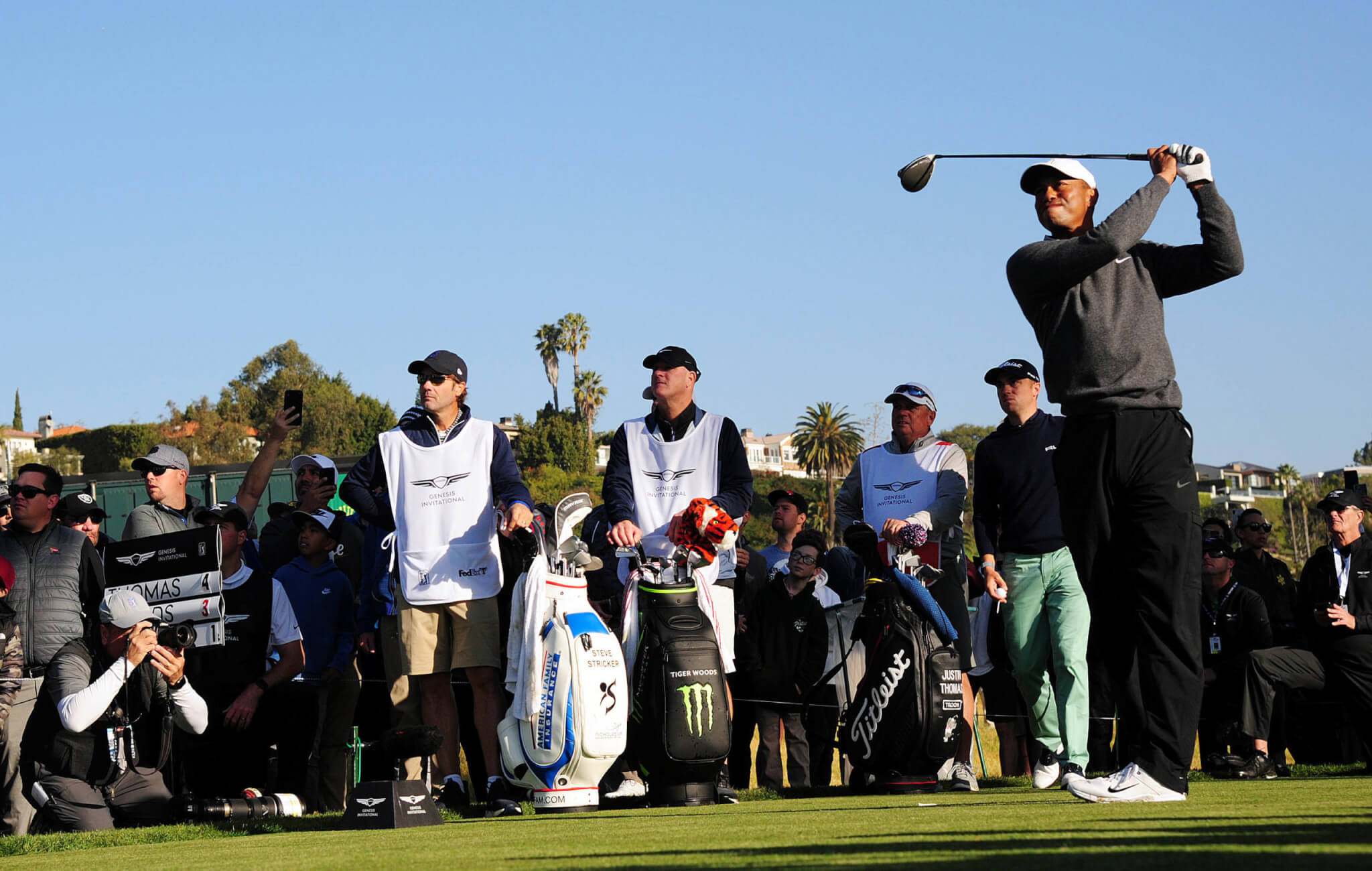 FAQ: Where should golfers stand when a player is swinging? - Caddie Network